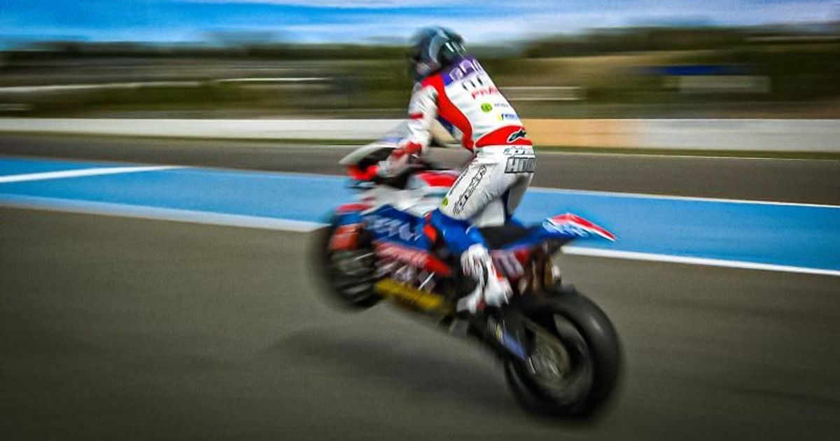 How do you pop a wheelie on a MotoE™ bike?